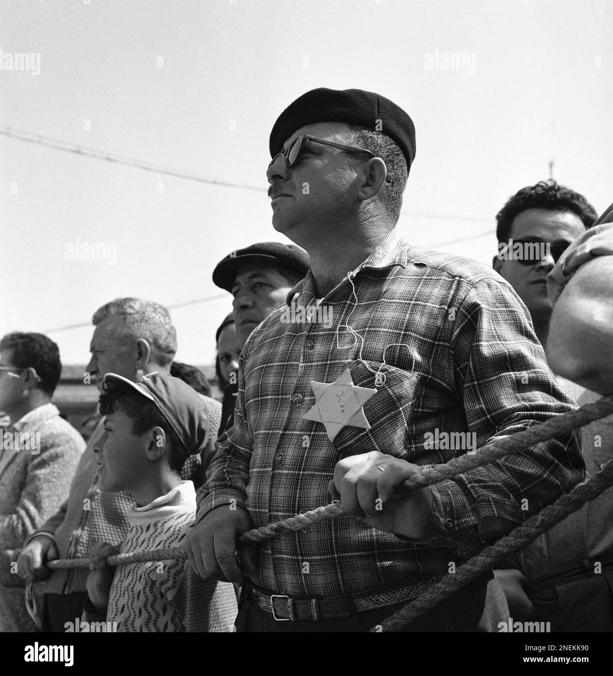 An immigrant to Israel from Europe proudly wears Star of David as he ...