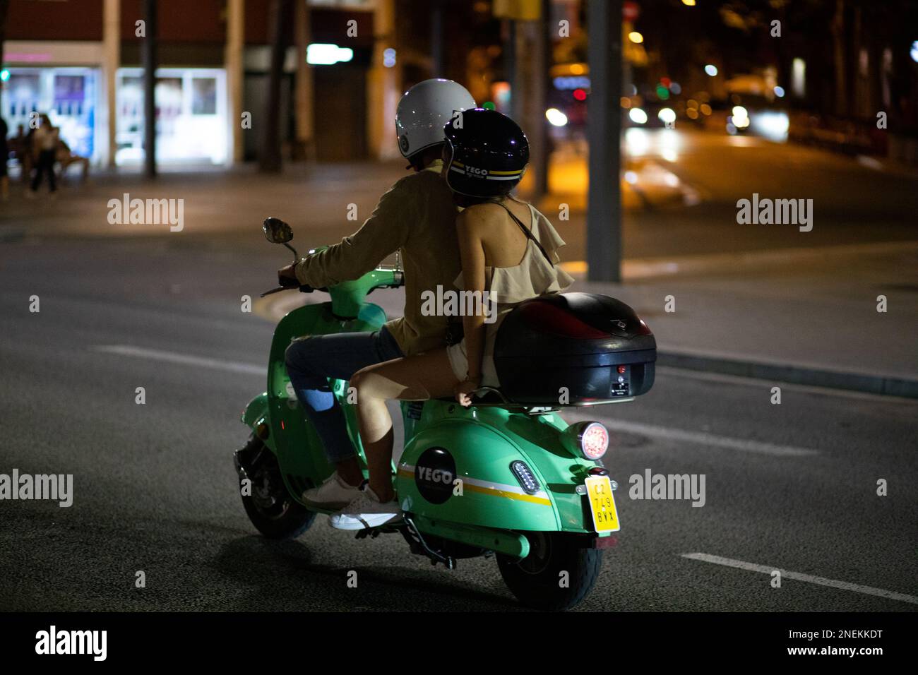 Moped Driving at Night in Barcelona, Spain Stock Photo - Alamy