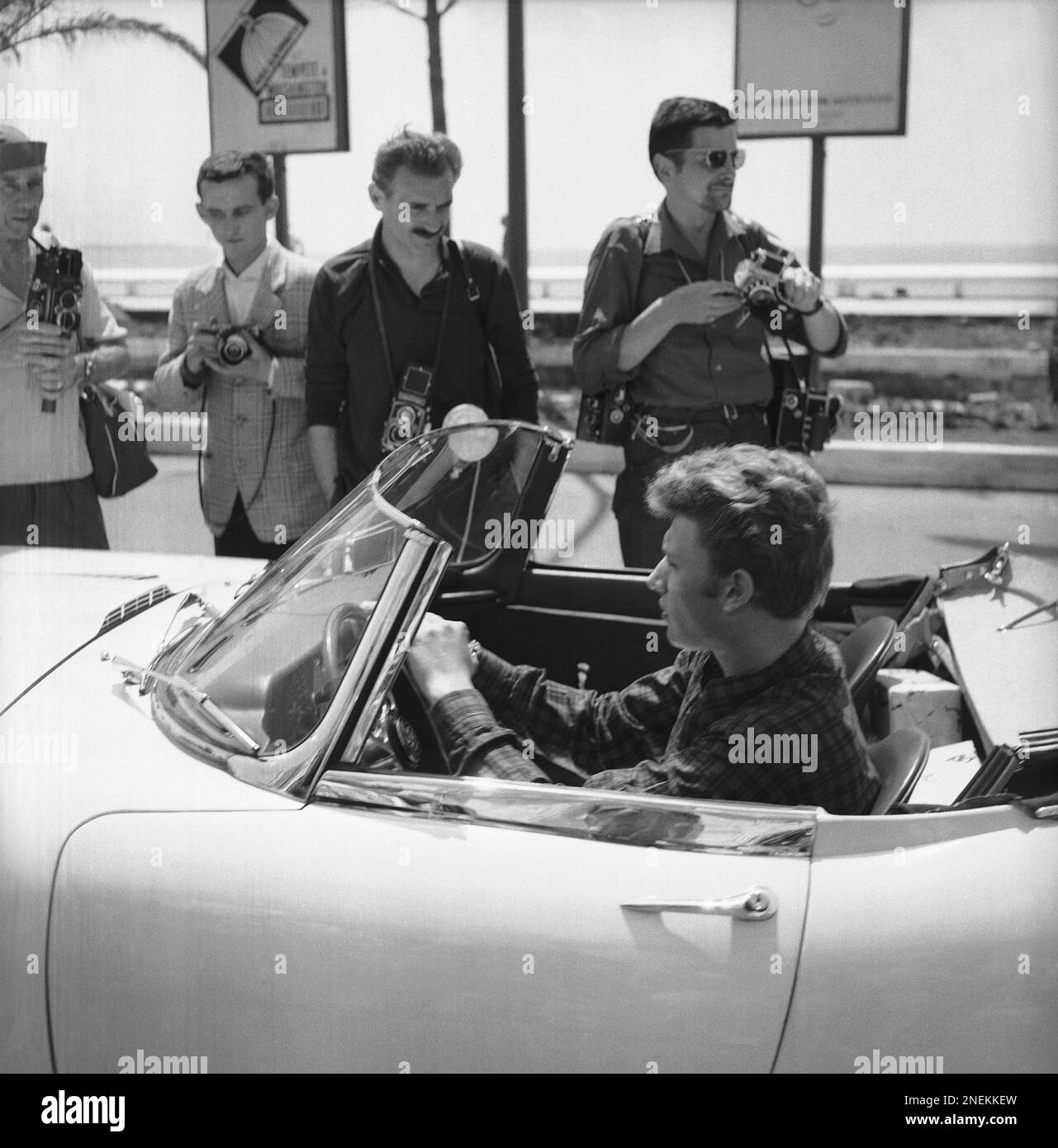 Singer Johnny Hallyday arrives in a sports car in Cannes Carlton Hotel ...