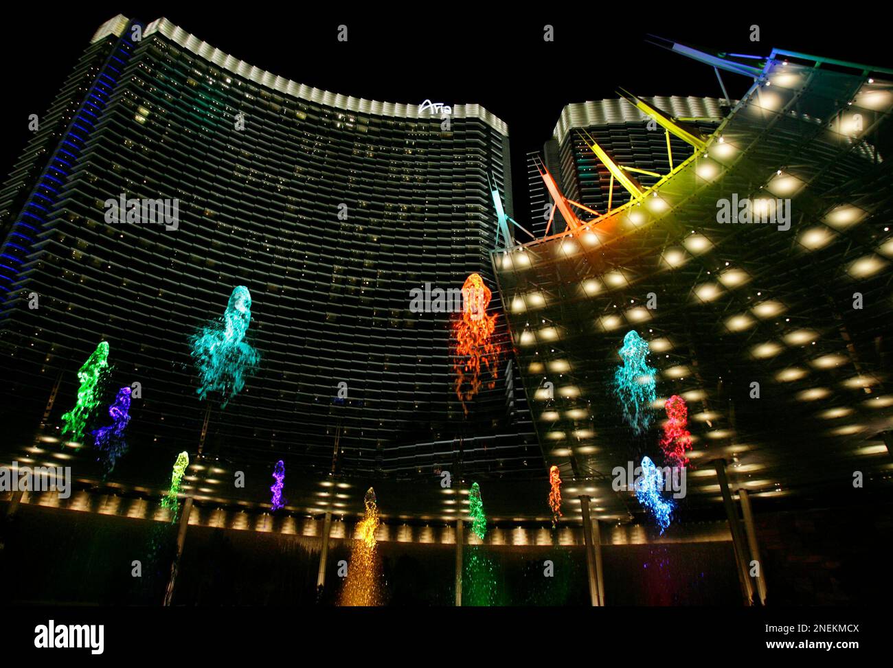 The fountain Lumia lights up the entrance to Aria Hotel and Casino a ...