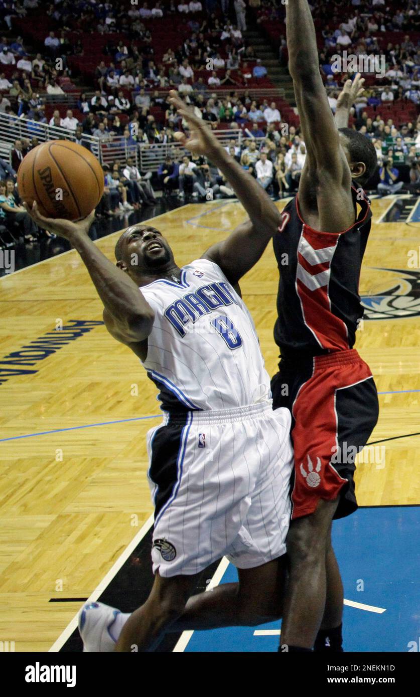 Orlando Magic guard Anthony Johnson (8) goes up for a shot in front of ...