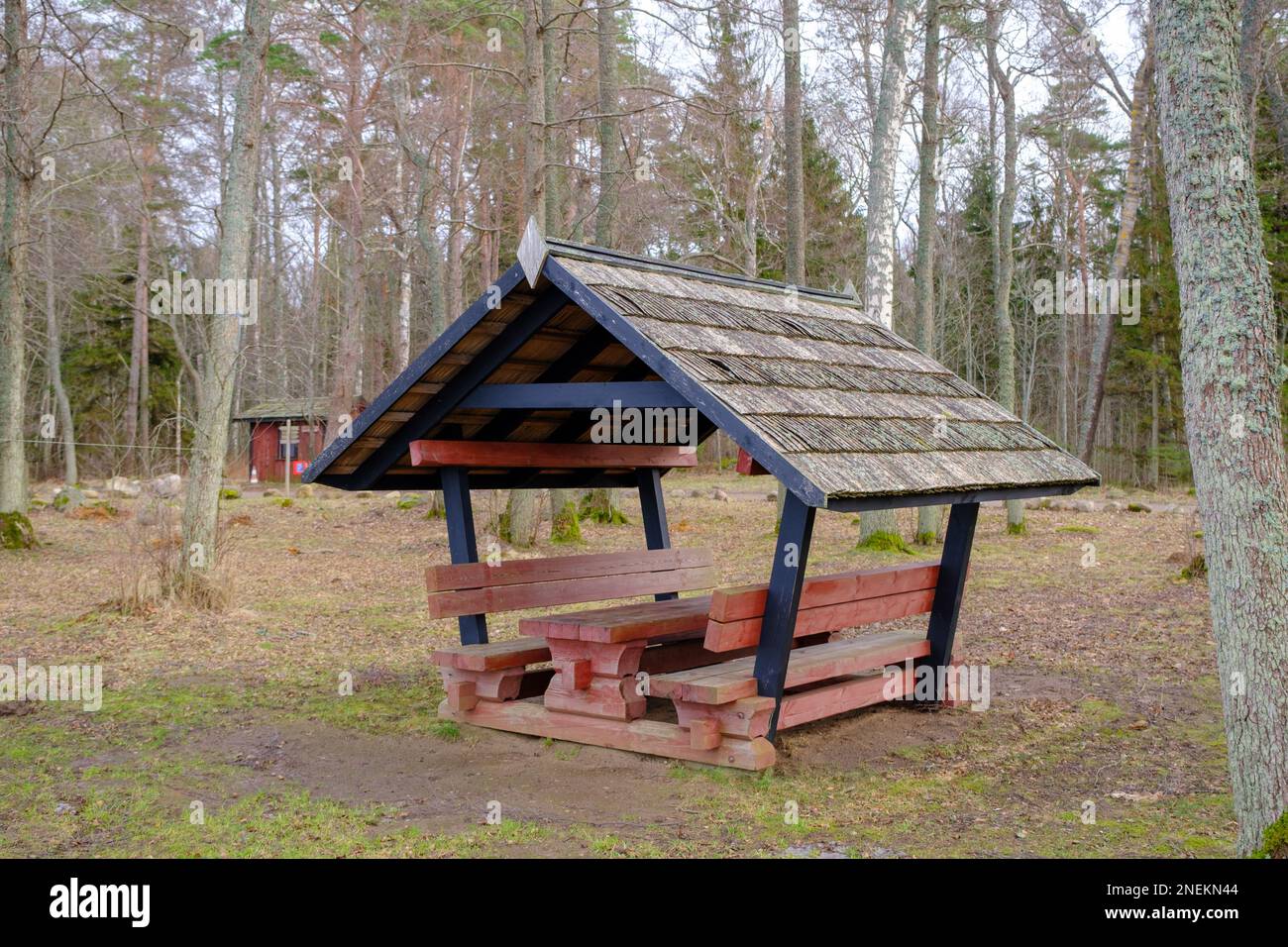 Wooden gazebo, resting place in the park. Equipped with wooden tables ...