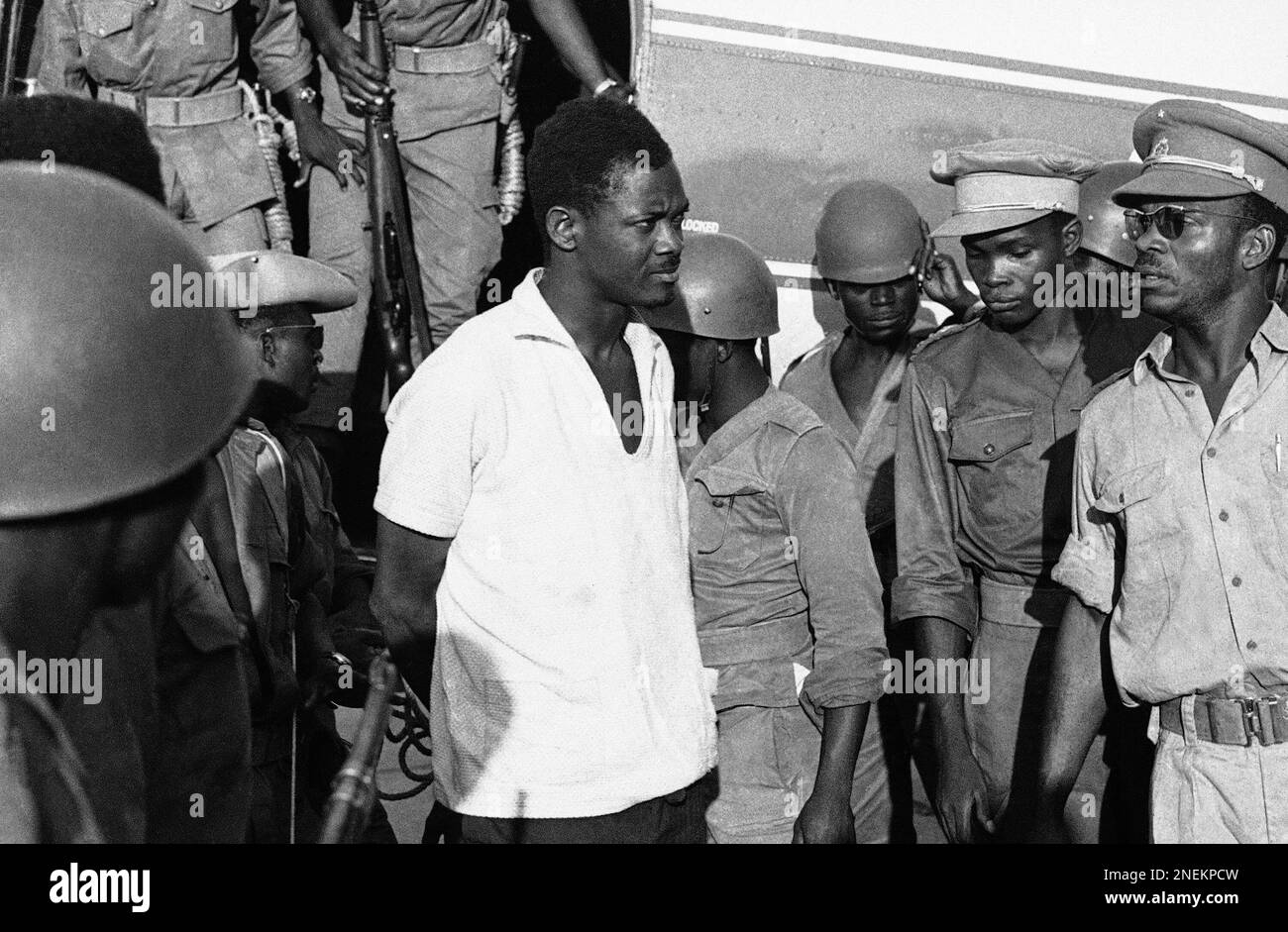 Hands manacled behind his back, deposed Congo Premier Patrice Lumumba ...
