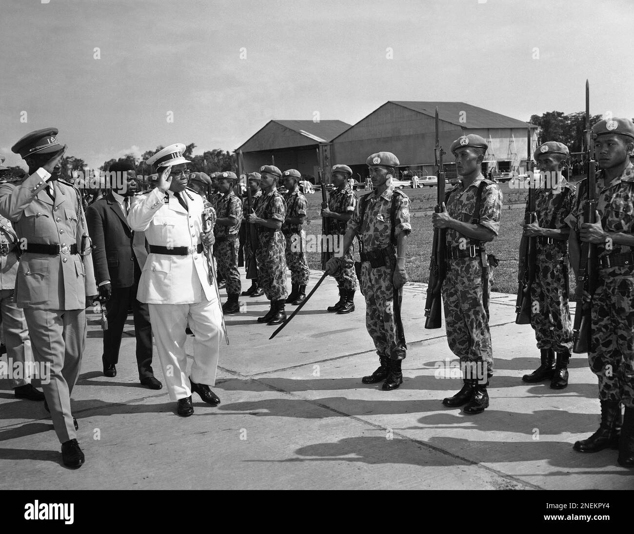 President Joseph Kasavubu of the Congo, wearing a white uniform ...