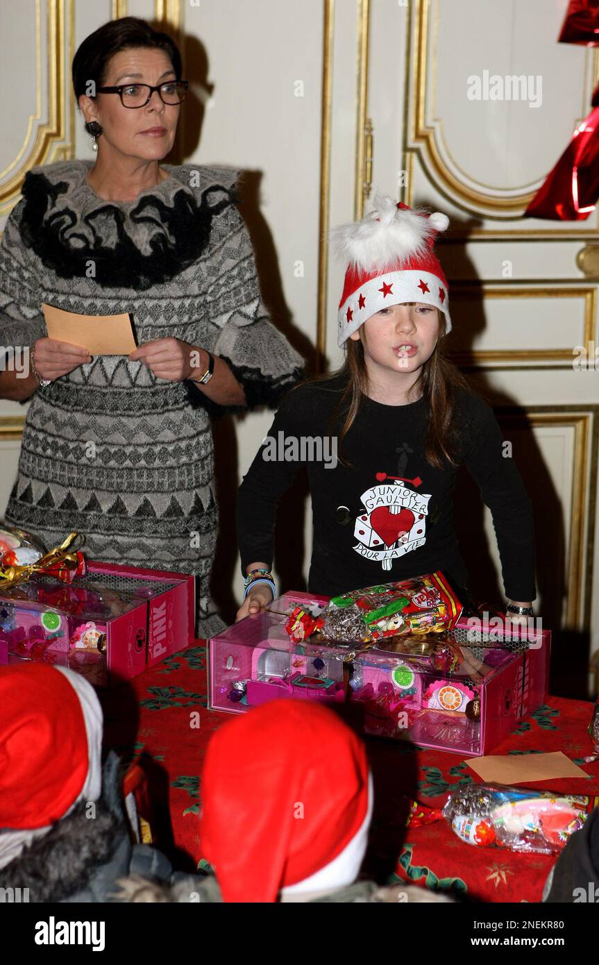 Princess Caroline of Monaco and her daughter Alexandra give presents to ...