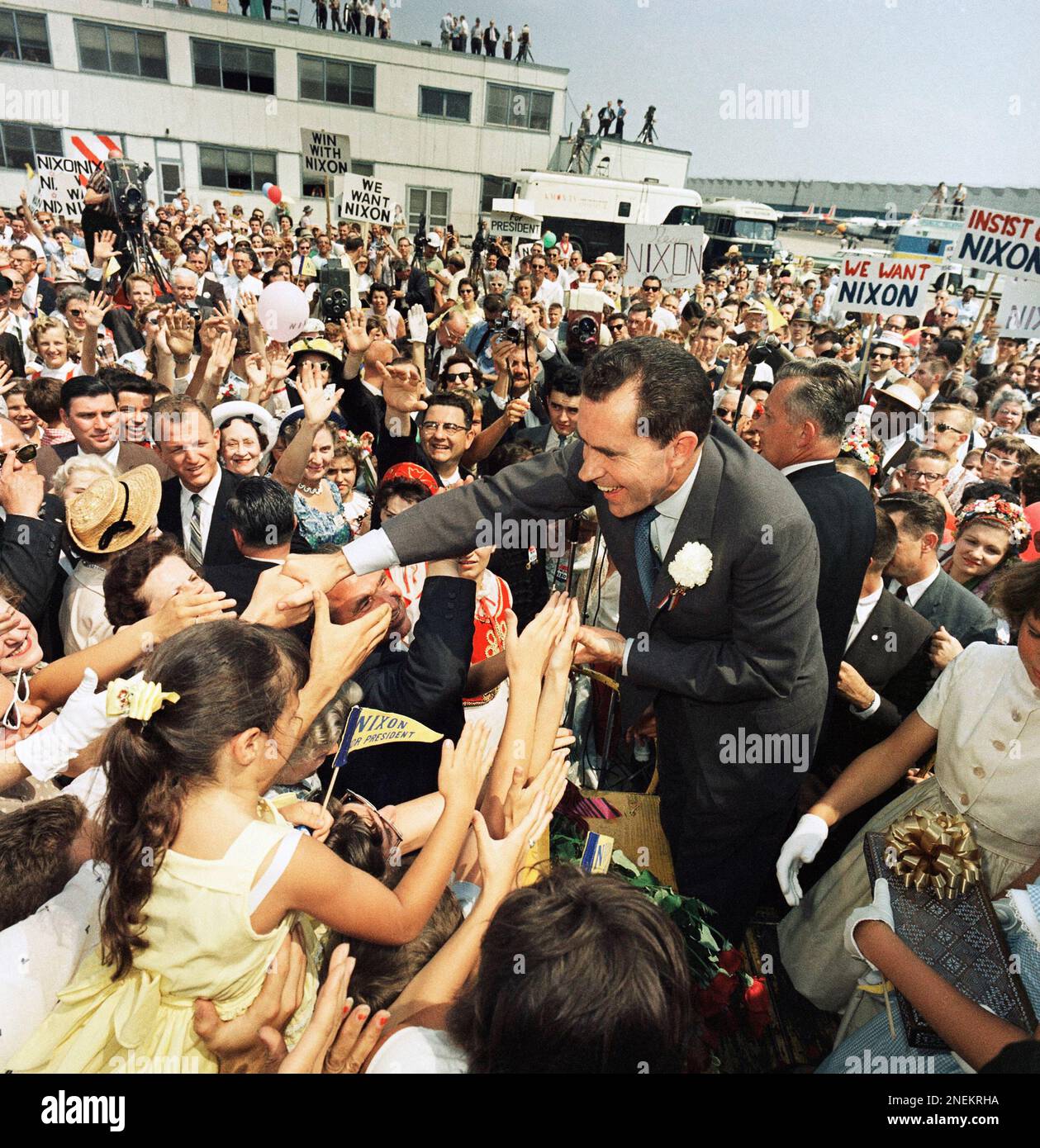 Vice President Richard M. Nixon and family, greeting people, getting ...
