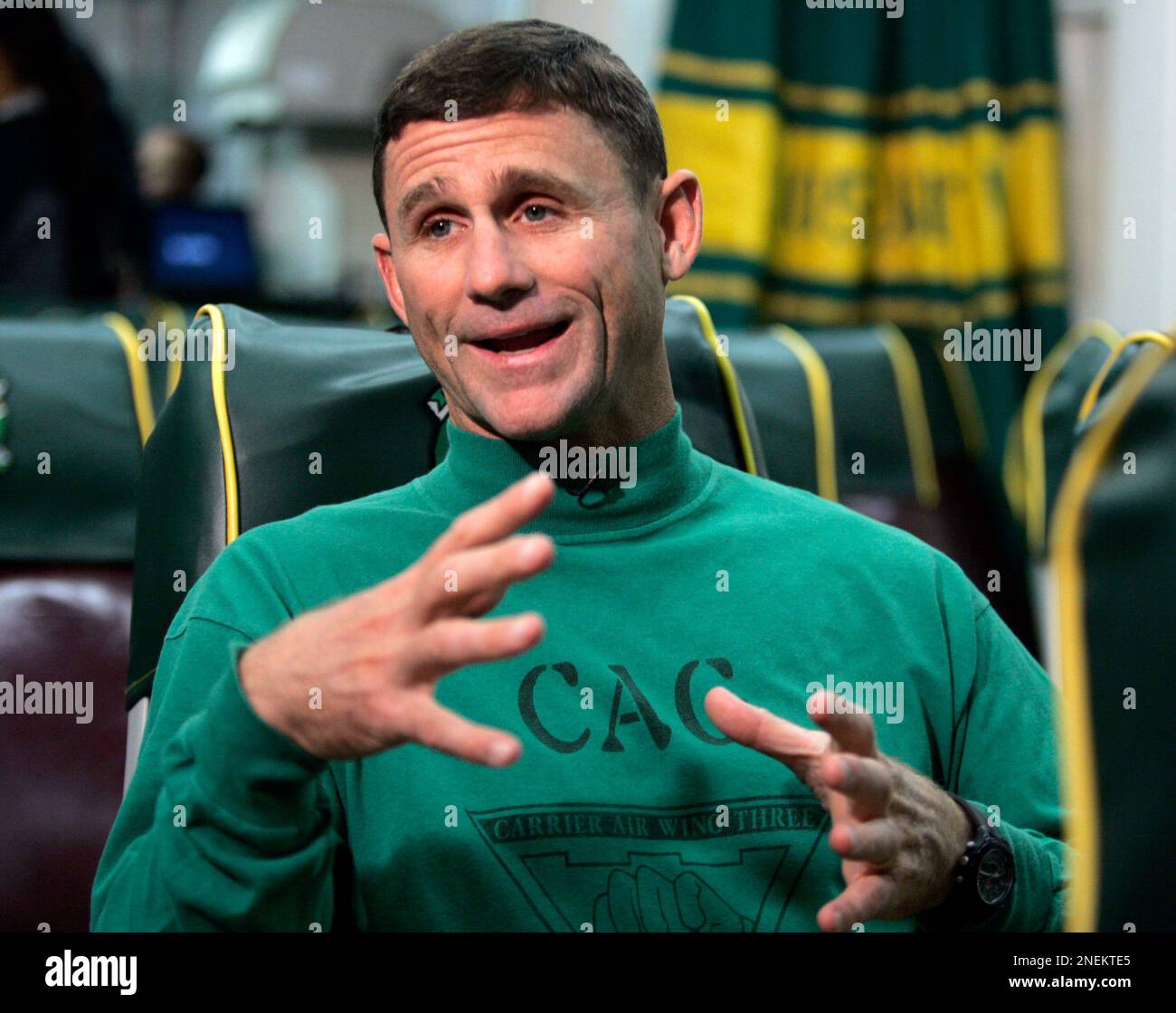 Commander of Carrier Air Wing, Cpt. Andy Lewis, speaks during an ...