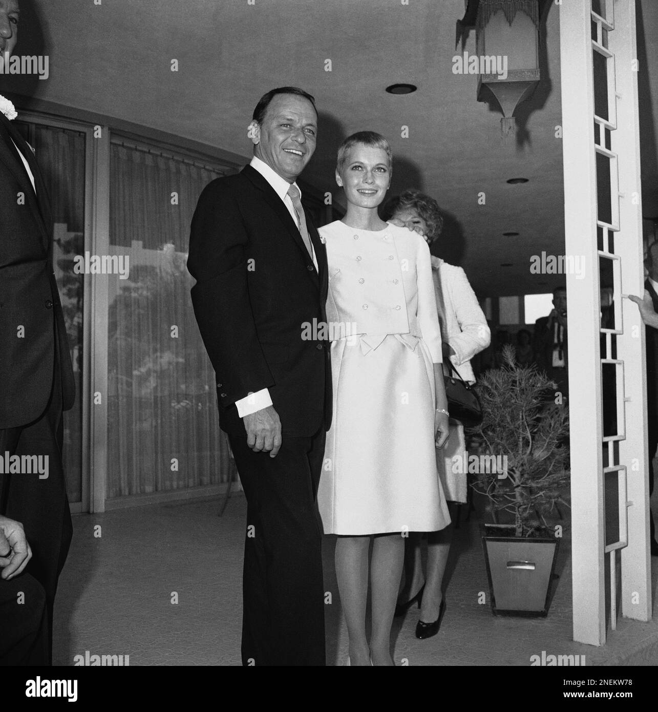 Movie actor Frank Sinatra poses with his third wife, Actress Mia Farrow ...