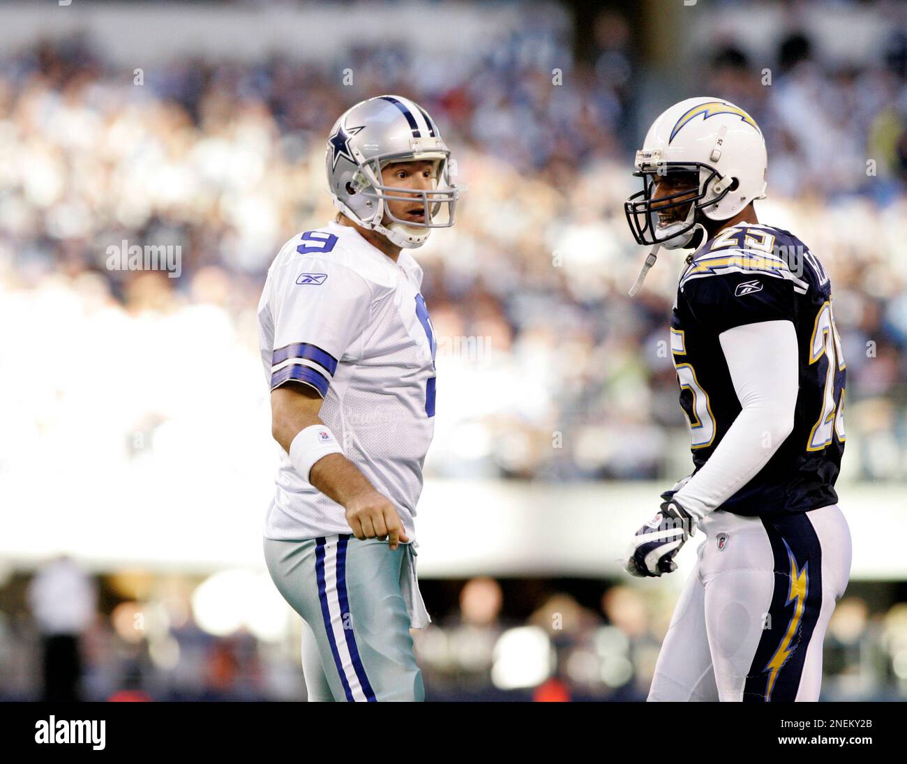 Dallas Cowboys quarterback Tony Romo (9) and San Diego Chargers safety ...