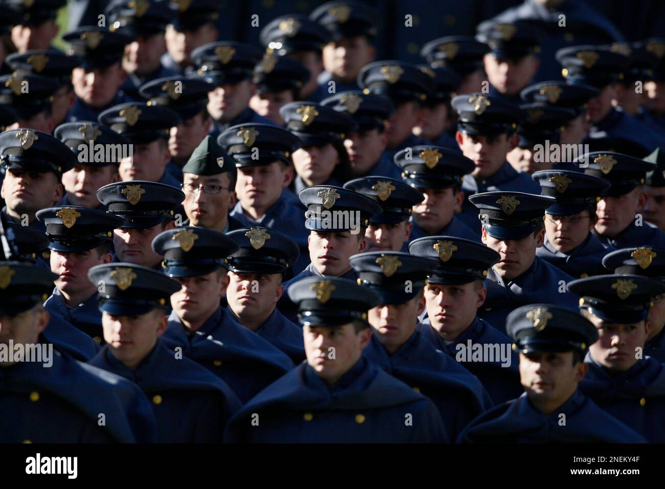 Army cadets take the field in formation before an NCAA college football ...