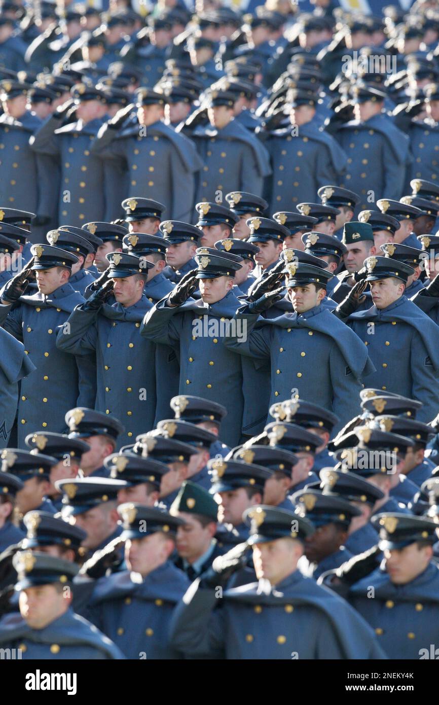 Army cadets take the field in formation before an NCAA college football ...