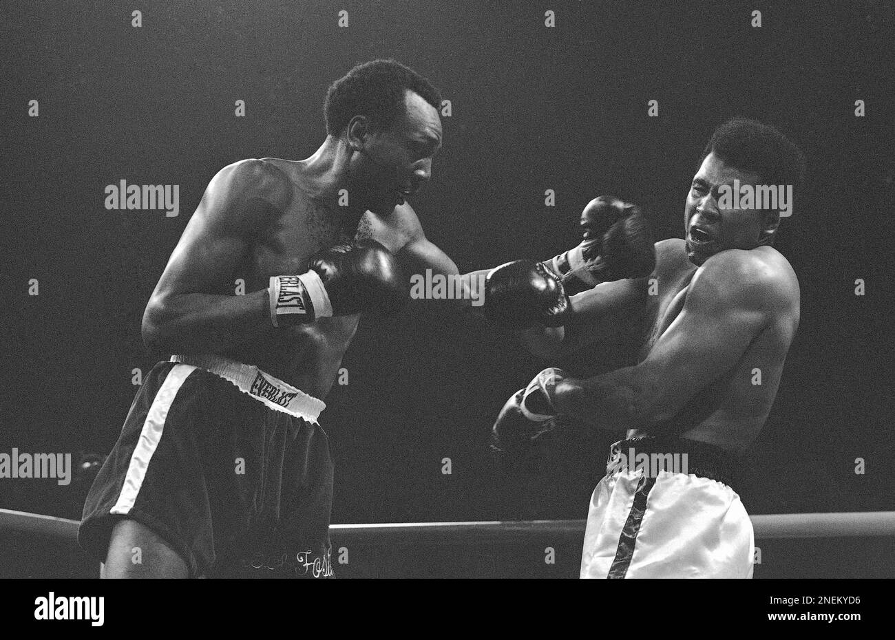 Bob Foster connects with a left to the face of Muhammad Ali during ...
