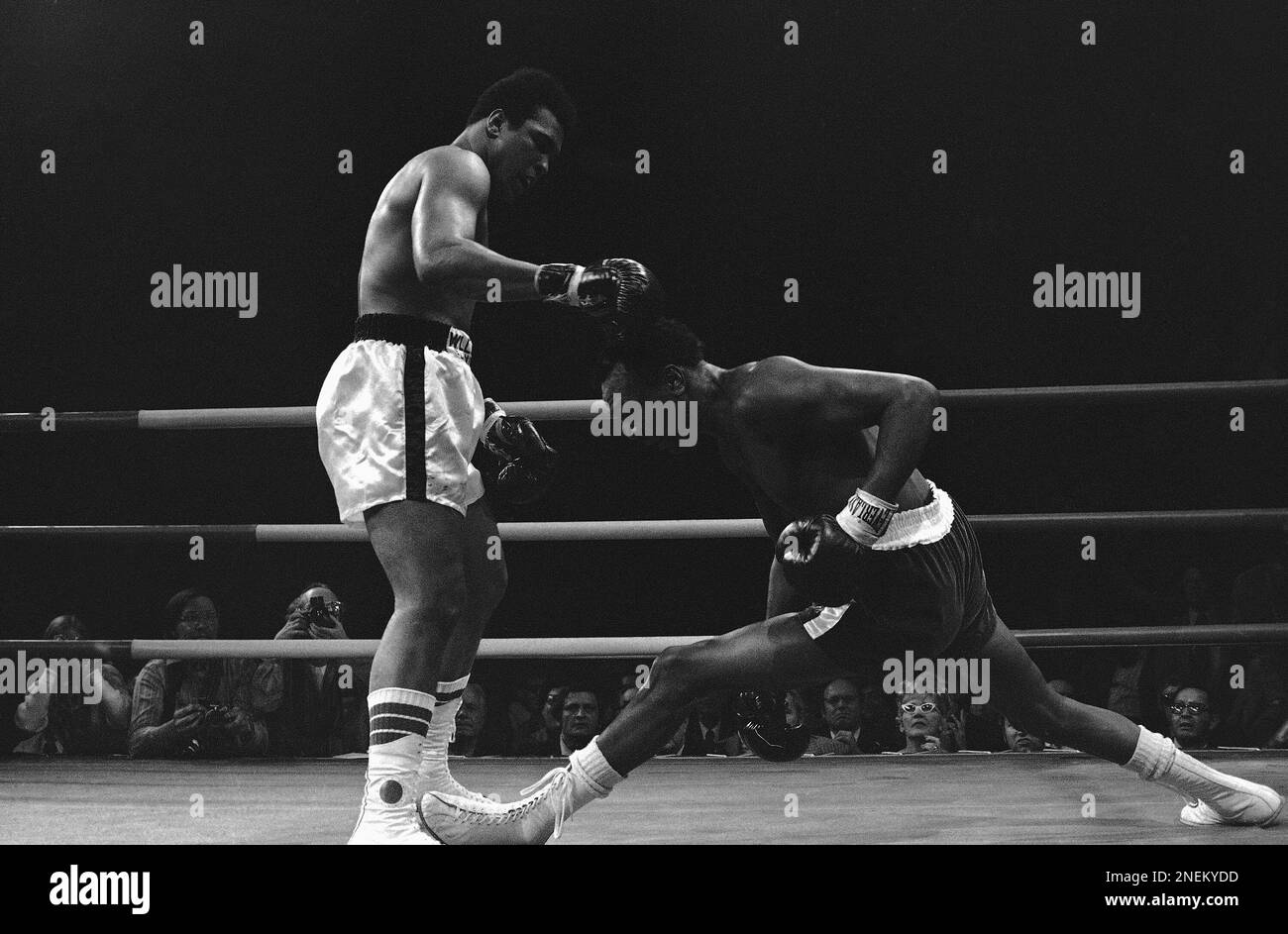Bob Foster stretches as he goes to the canvas when Muhammad Ali knocked ...