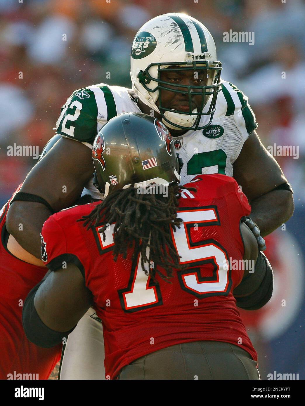 Tampa Bay Buccaneers guard Davin Joseph (75) stops New York Jets ...