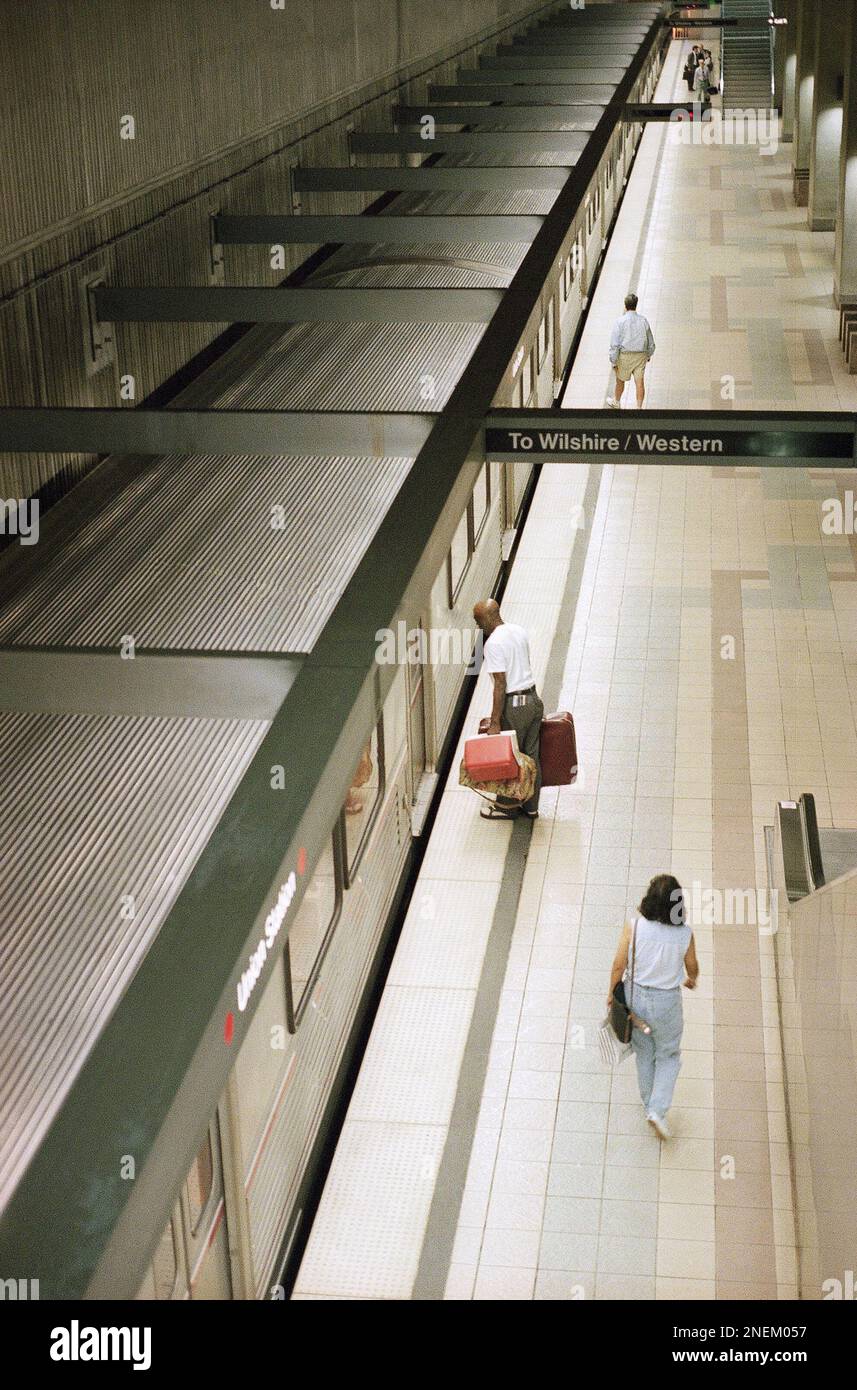 Passengers wait to board the MTA?s red line at the Pershing Square ...