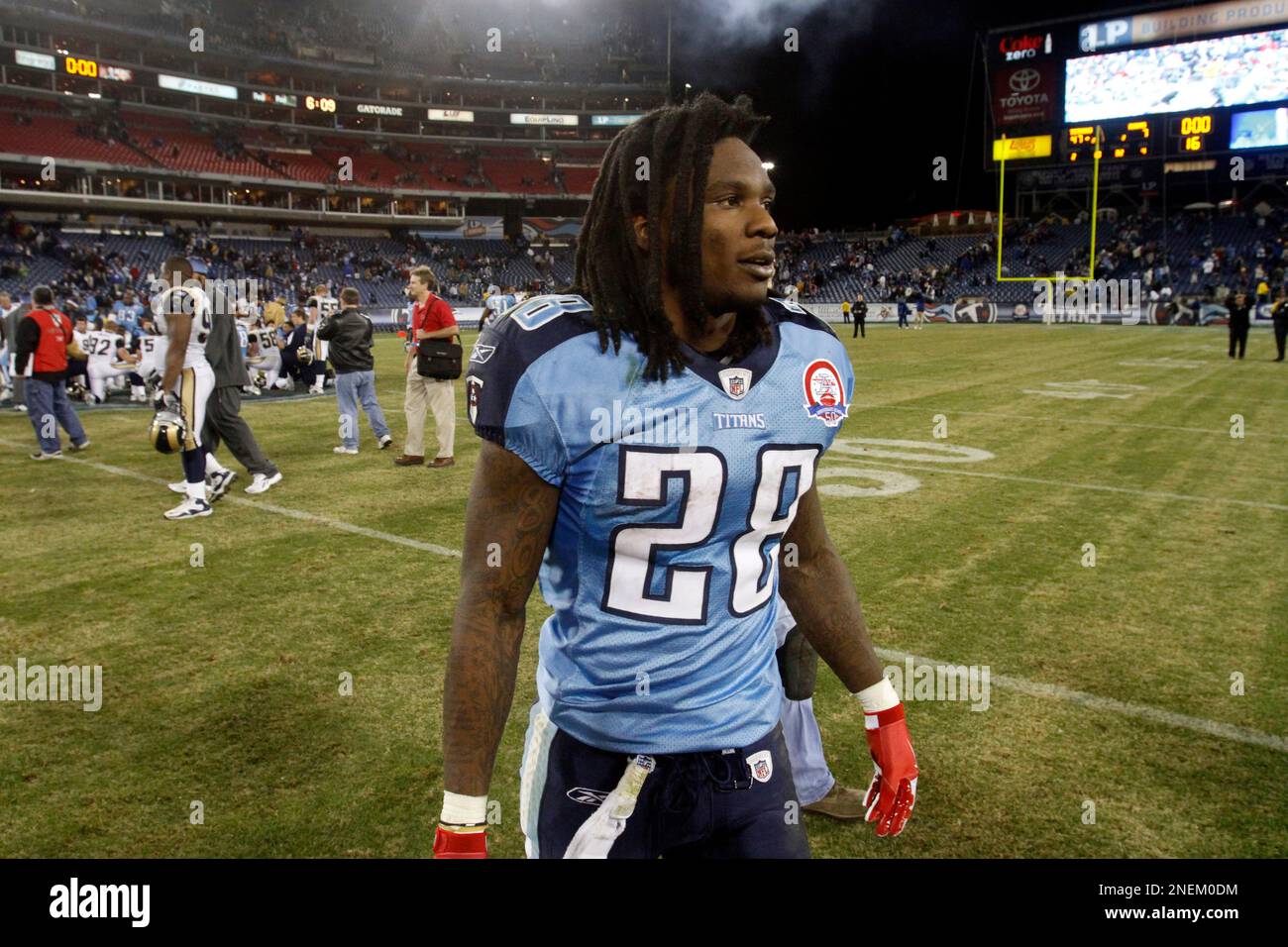 Tennessee Titans running back Chris Johnson (28) leaves the field after ...