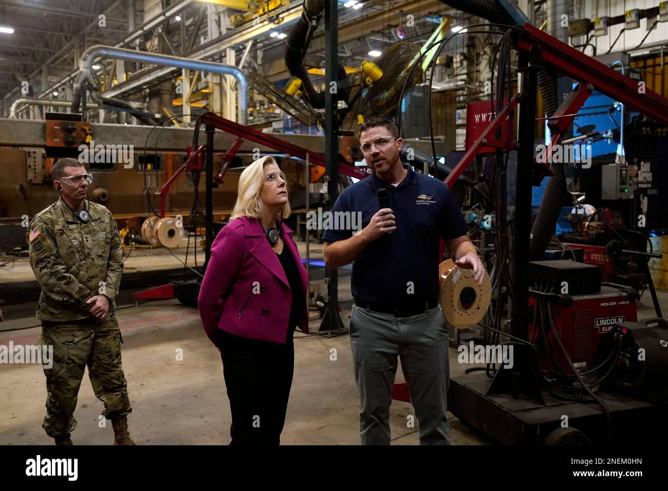 Secretary of the Army Christine Wormuth looks over the construction of ...