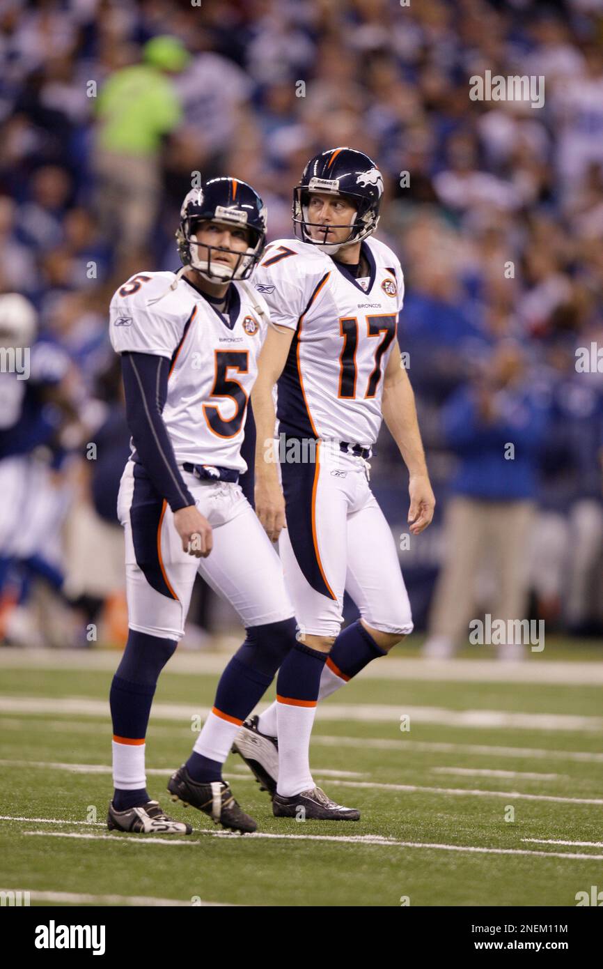 Denver Broncos kicker Matt Prater and holder Mitch Berger walk off the field after a missed ...