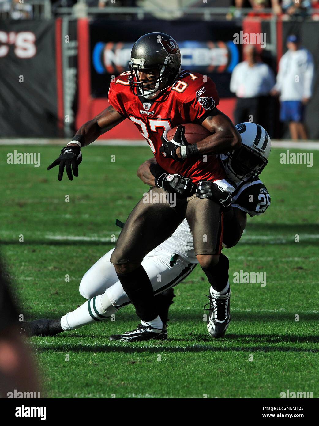 New York Jets cornerback Lito Sheppard (26) tackles Tampa Bay ...