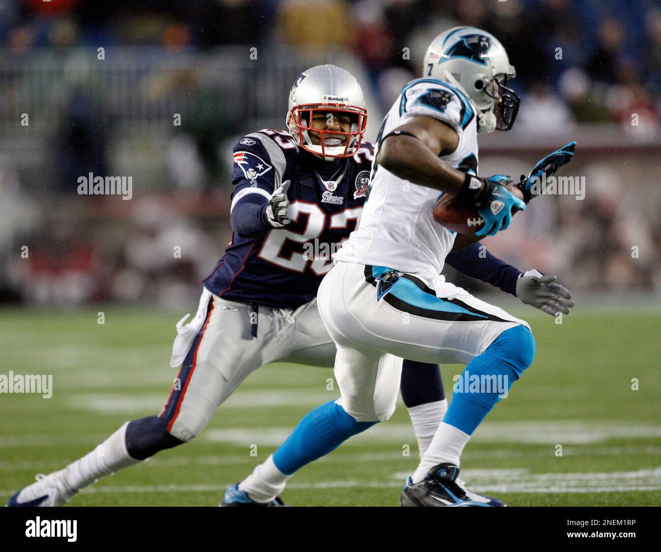 Carolina Panthers wide receiver Muhsin Muhammad (87) tries to get away ...