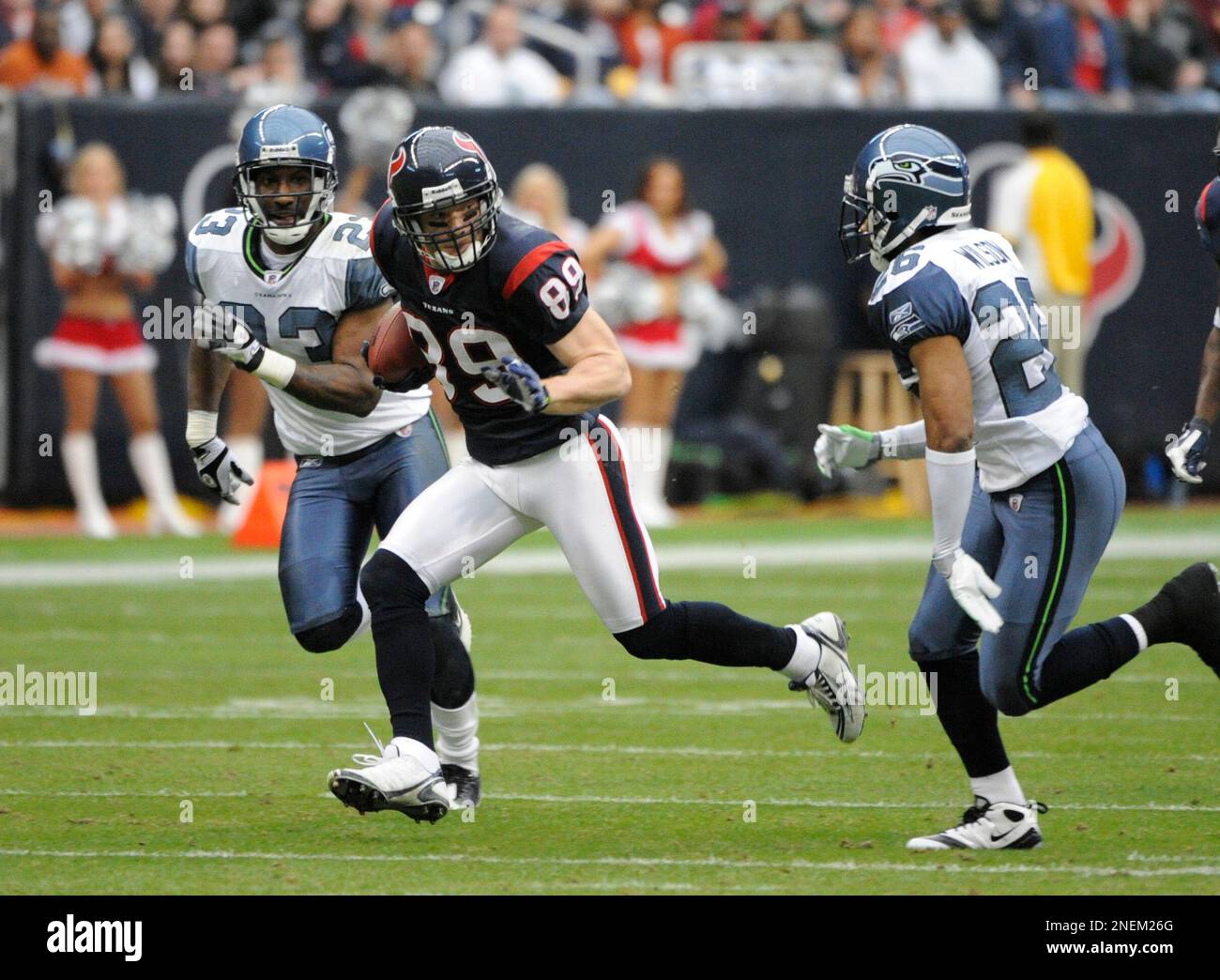 Houston Texans wide receiver David Anderson (89) runs between Seattle ...