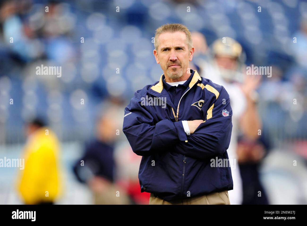 St. Louis Rams head coach Steve Spagnuolo watches his players warm up ...