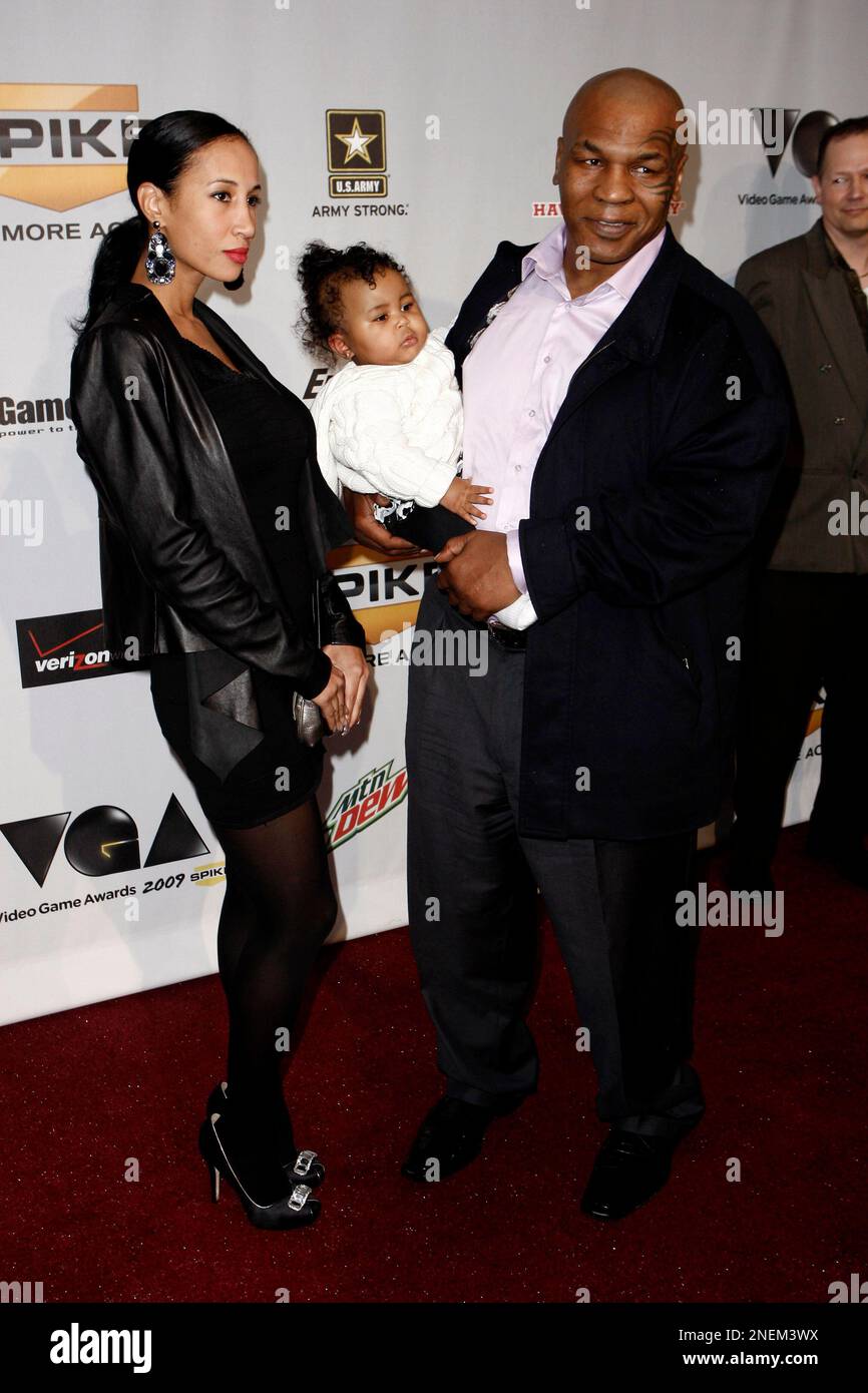Lakiha Spicer, left, Mila Tyson, center, and Mike Tysonarrive at Spike ...