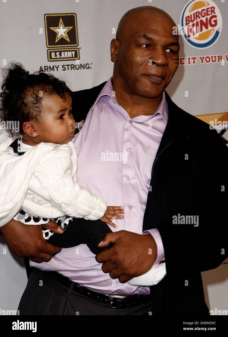 Mike Tyson and daughter Mila arrive at Spike TV's Video Game Awards on ...