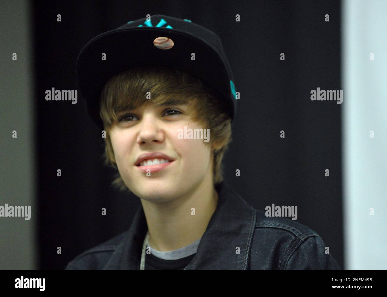 Justin Bieber poses in the press room at the 2009 Z100 Jingle Ball at ...