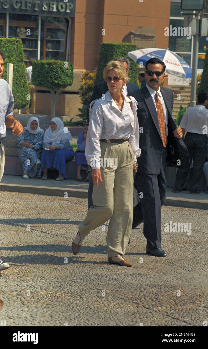 American actress Jane Fonda, accompanied by an Egyptian bodyguard ...
