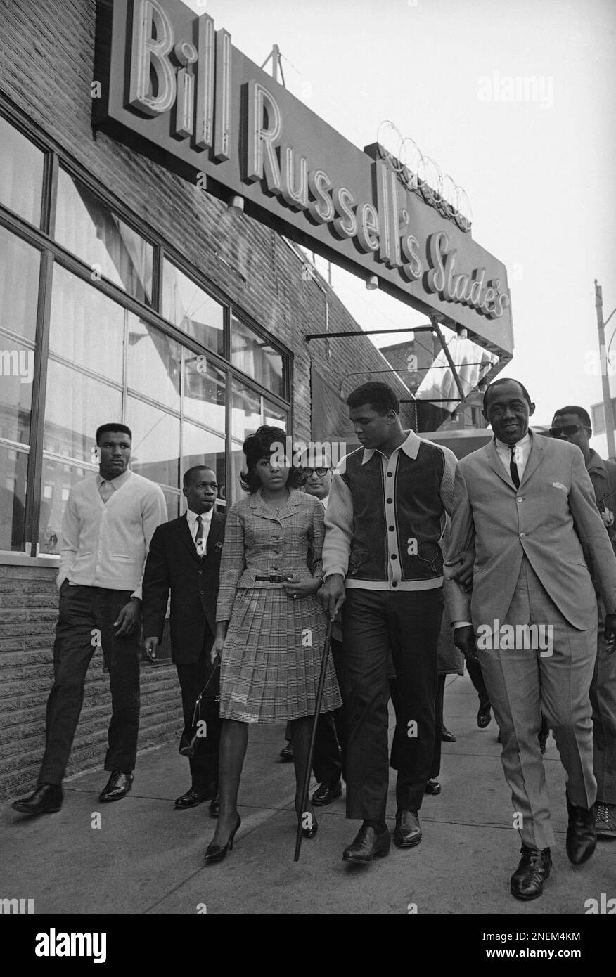 Muhammad Ali walks in front of Bill Russell?s chicken house in Boston ...