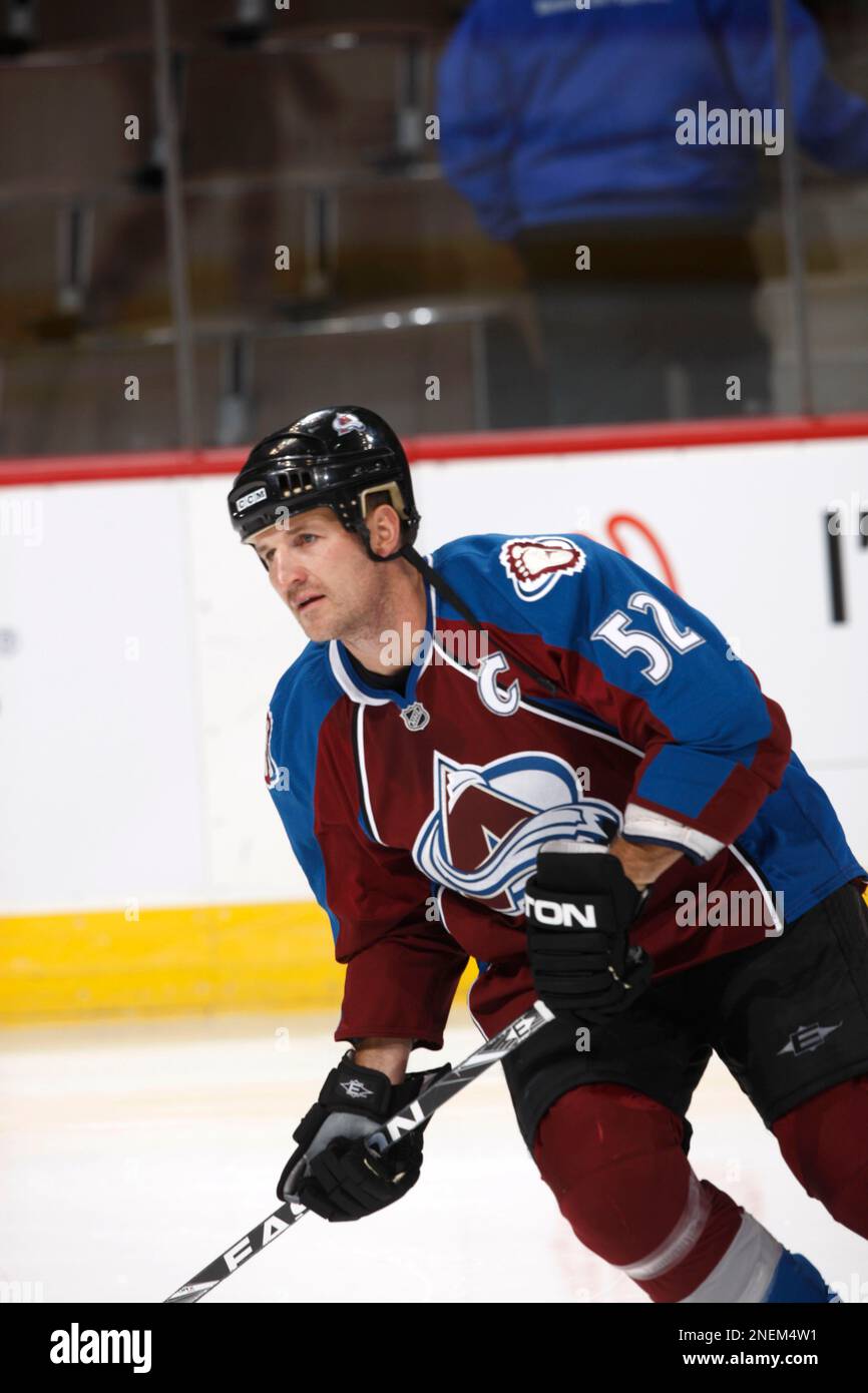 Colorado Avalanche defenseman Adam Foote warms up before facing the ...