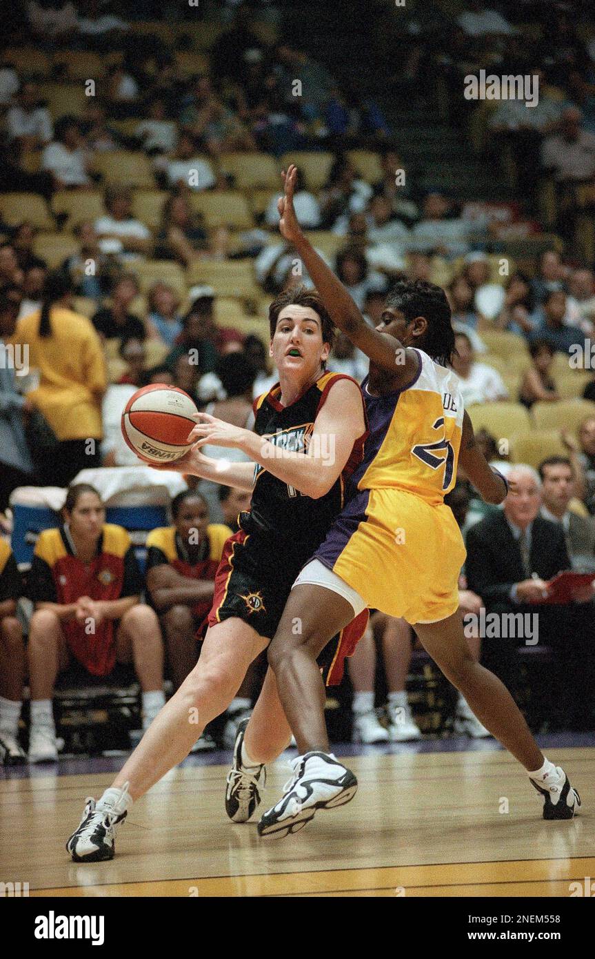 Detroit Shock Carla Porter pushes past Los Angeles Sparks Octavia Blue ...