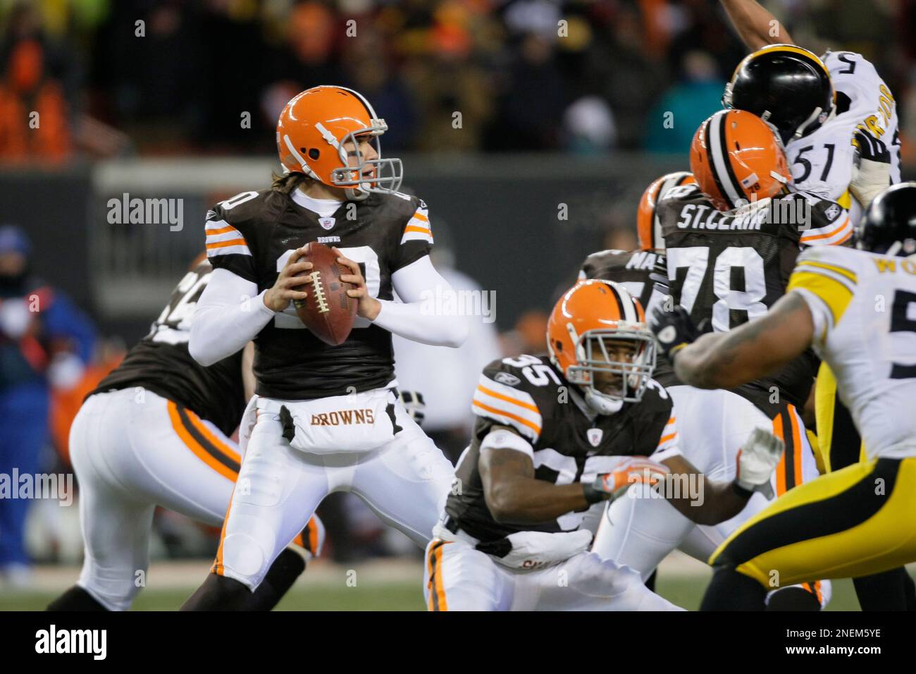 Cleveland Browns quarterback Brady Quinn drops to pass during an NFL ...