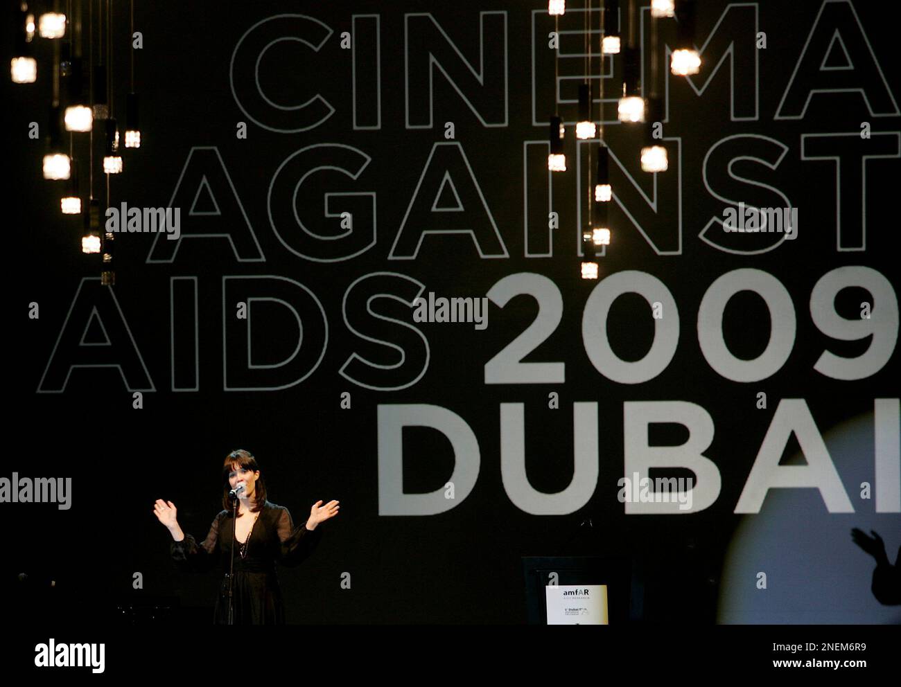 American actress and Singer Mandy Moore performs at the amfAR Cinema ...