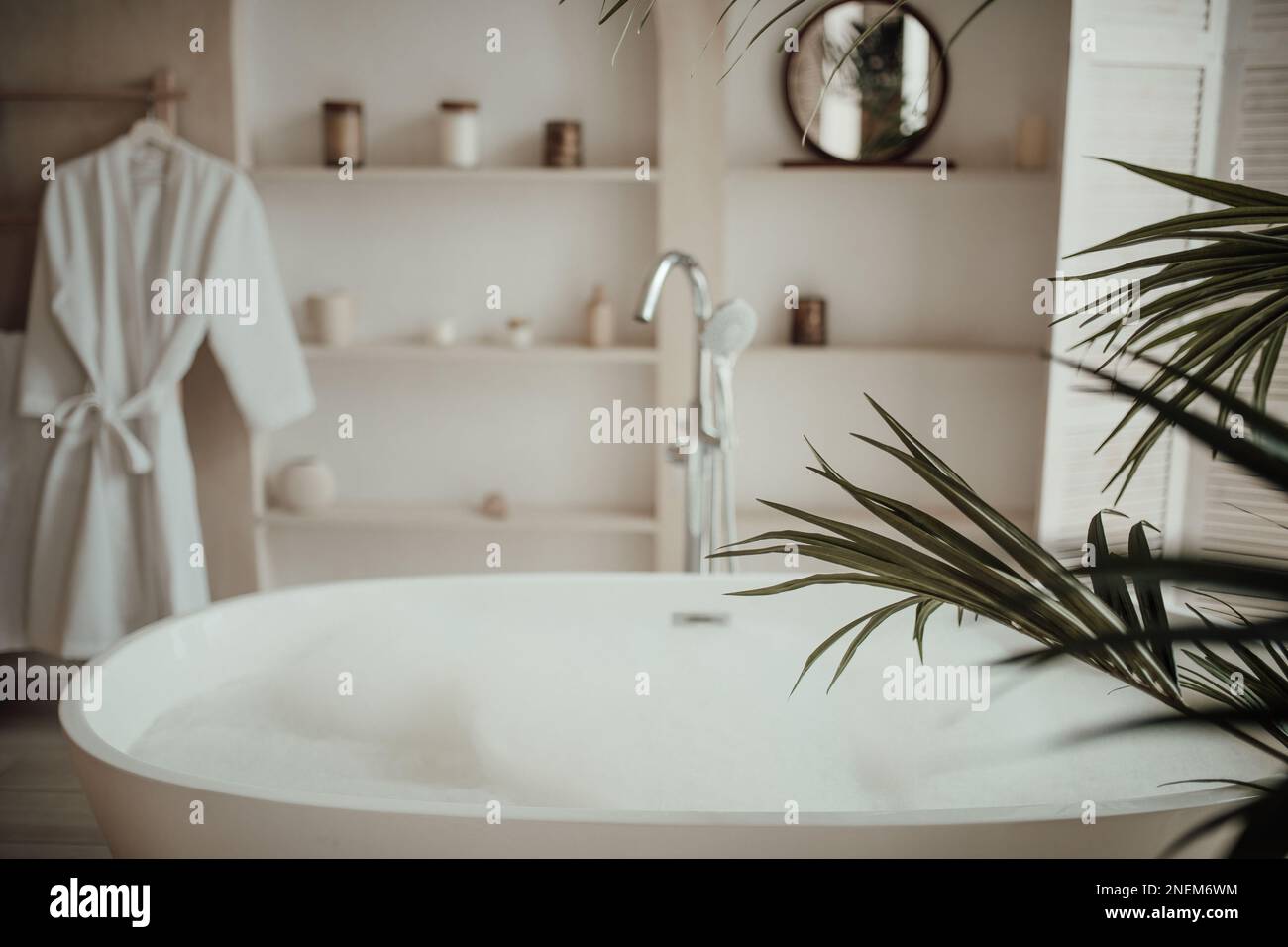 Soft native hues organic shapes look of bathroom with big window oval ...