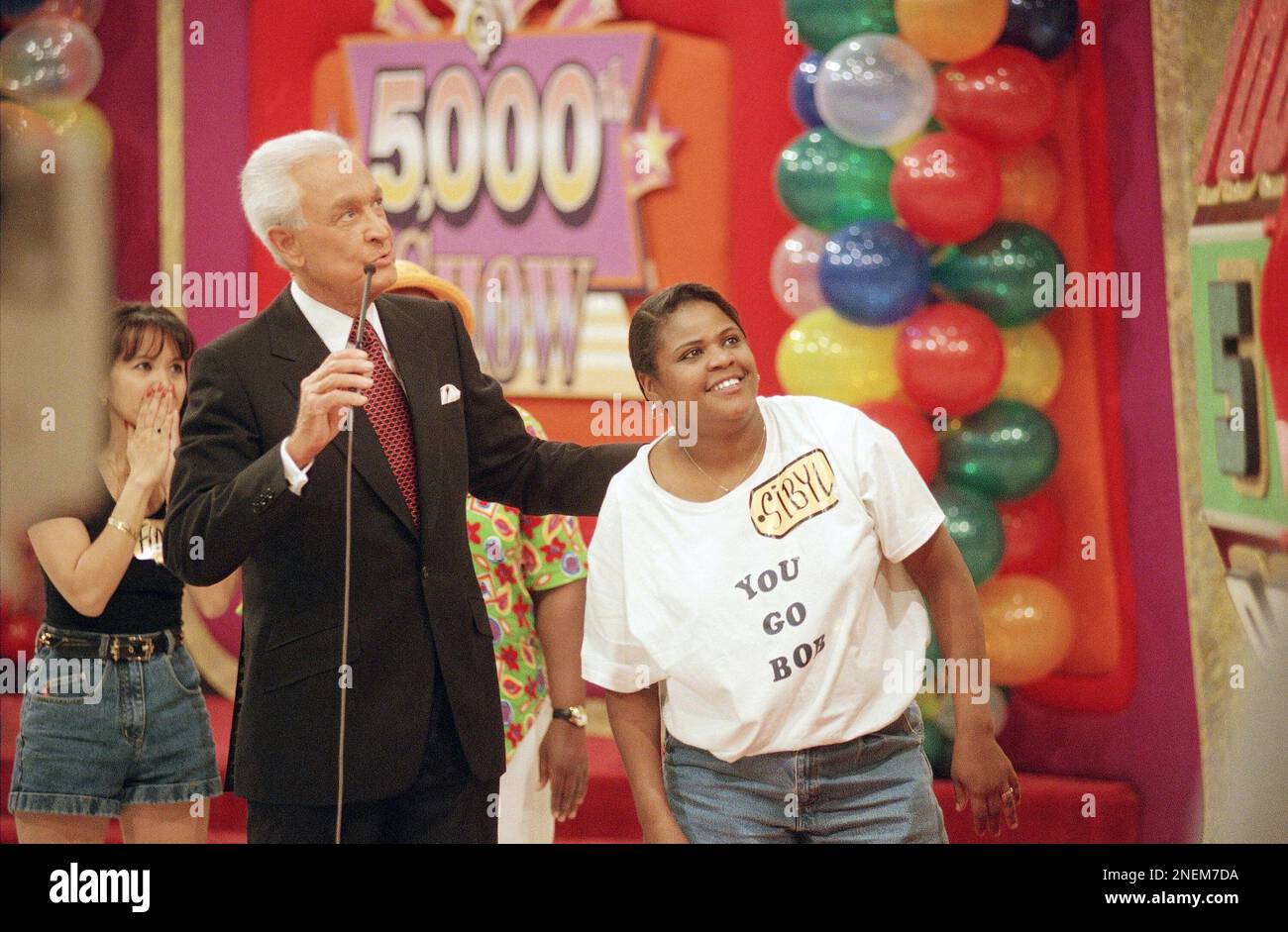 Bob Barker, host of ?The Price Is Right,? looks on as contestants play ...