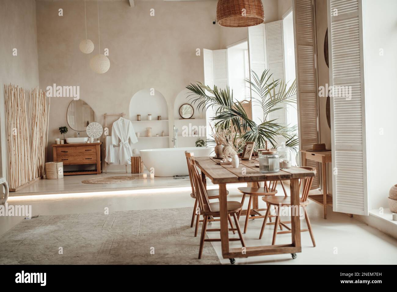 Soft native hues organic shapes look of bathroom with big window oval ...
