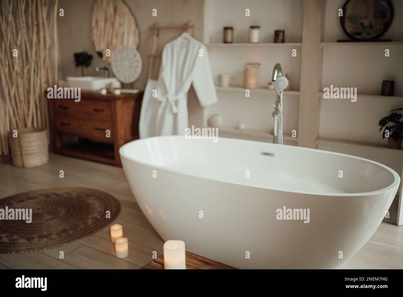 Soft native hues organic shapes look of bathroom with big window oval ...