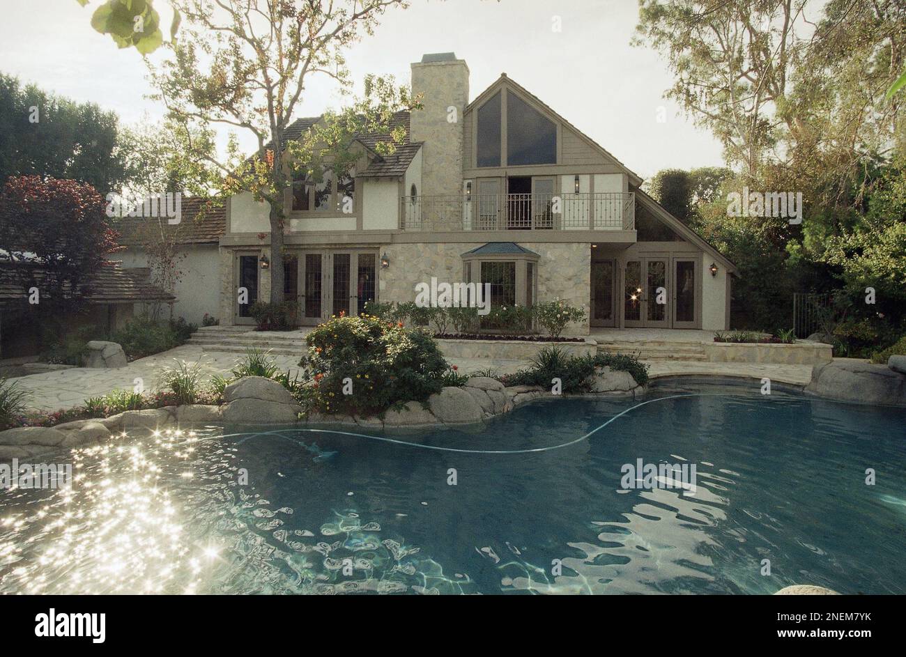 O.J. Simpson?s former estate and pool are shown from the backyard ...