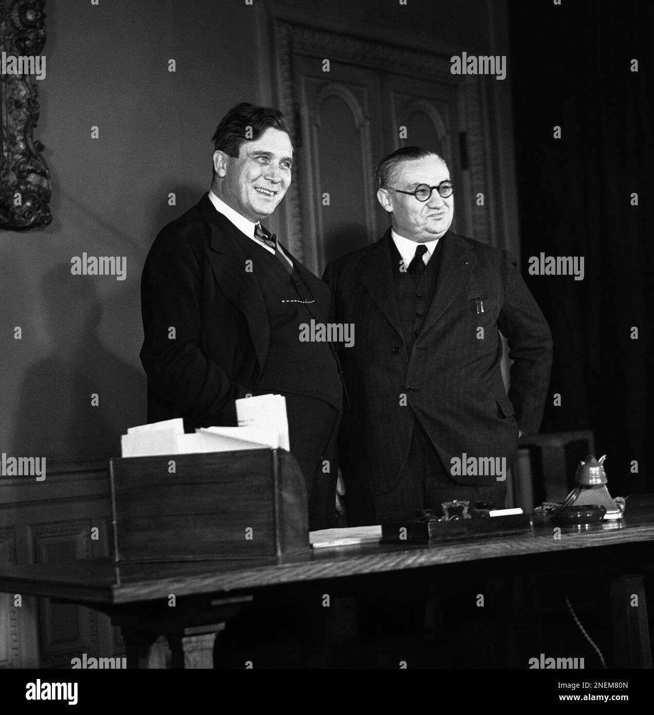 Britain's Minister of Labour Ernest Bevin, right, with American Wendell ...