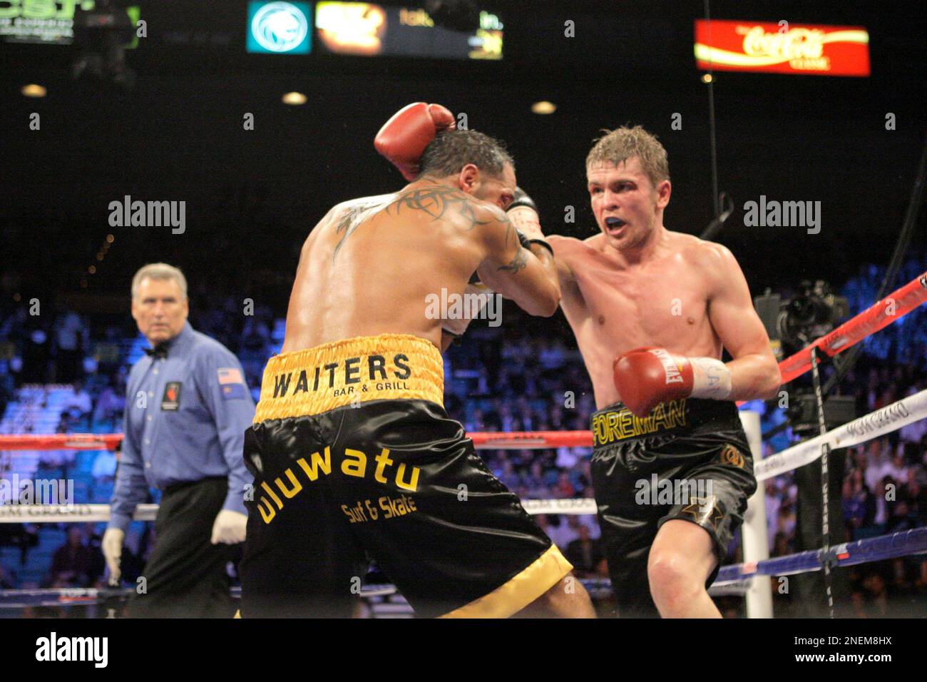 Daniel Santos, from Puerto Rico, left, against Yuri Foreman, from ...