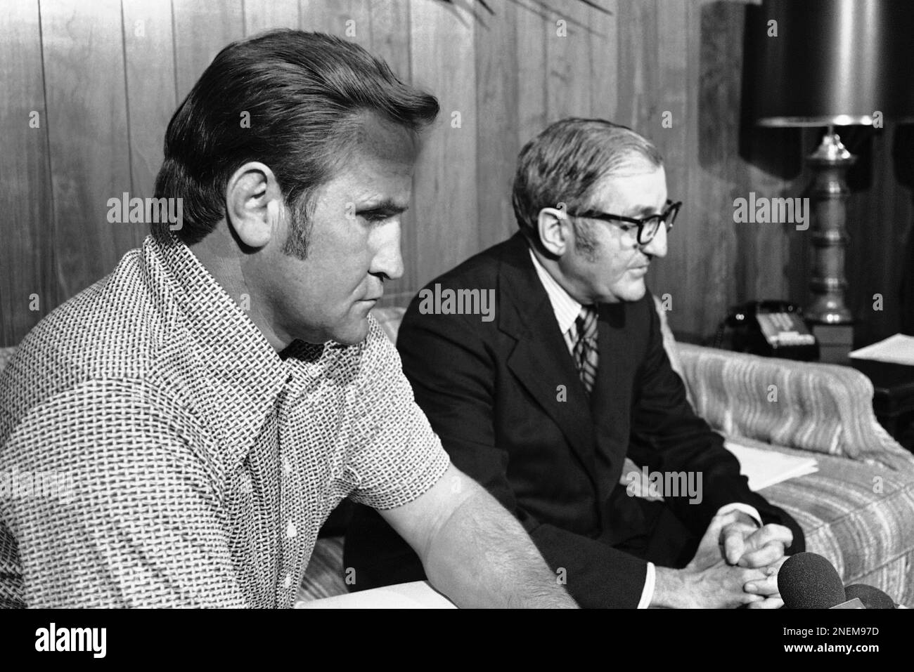 Miami Dolphin Coach Don Shula, left, listens as Dolphin managing ...