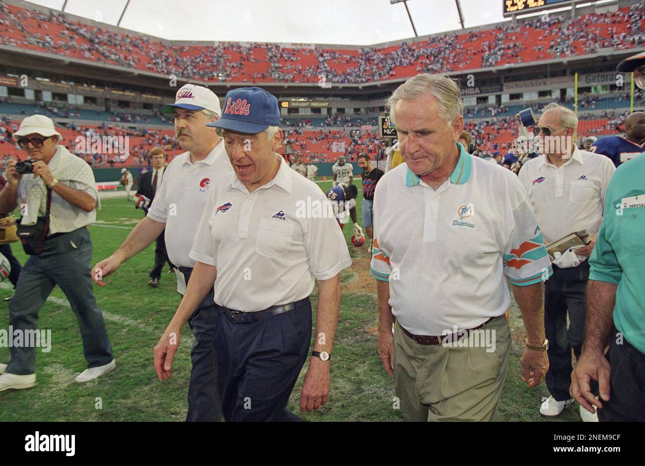 Miami Dolphins coach Don Shula, right, walks off the field with Buffalo ...