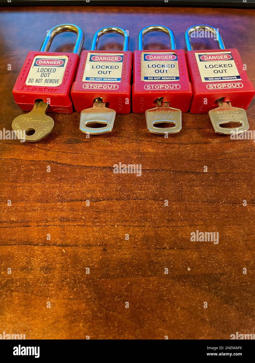 Red Lock out tag out locks locks . High quality photo Stock Photo - Alamy