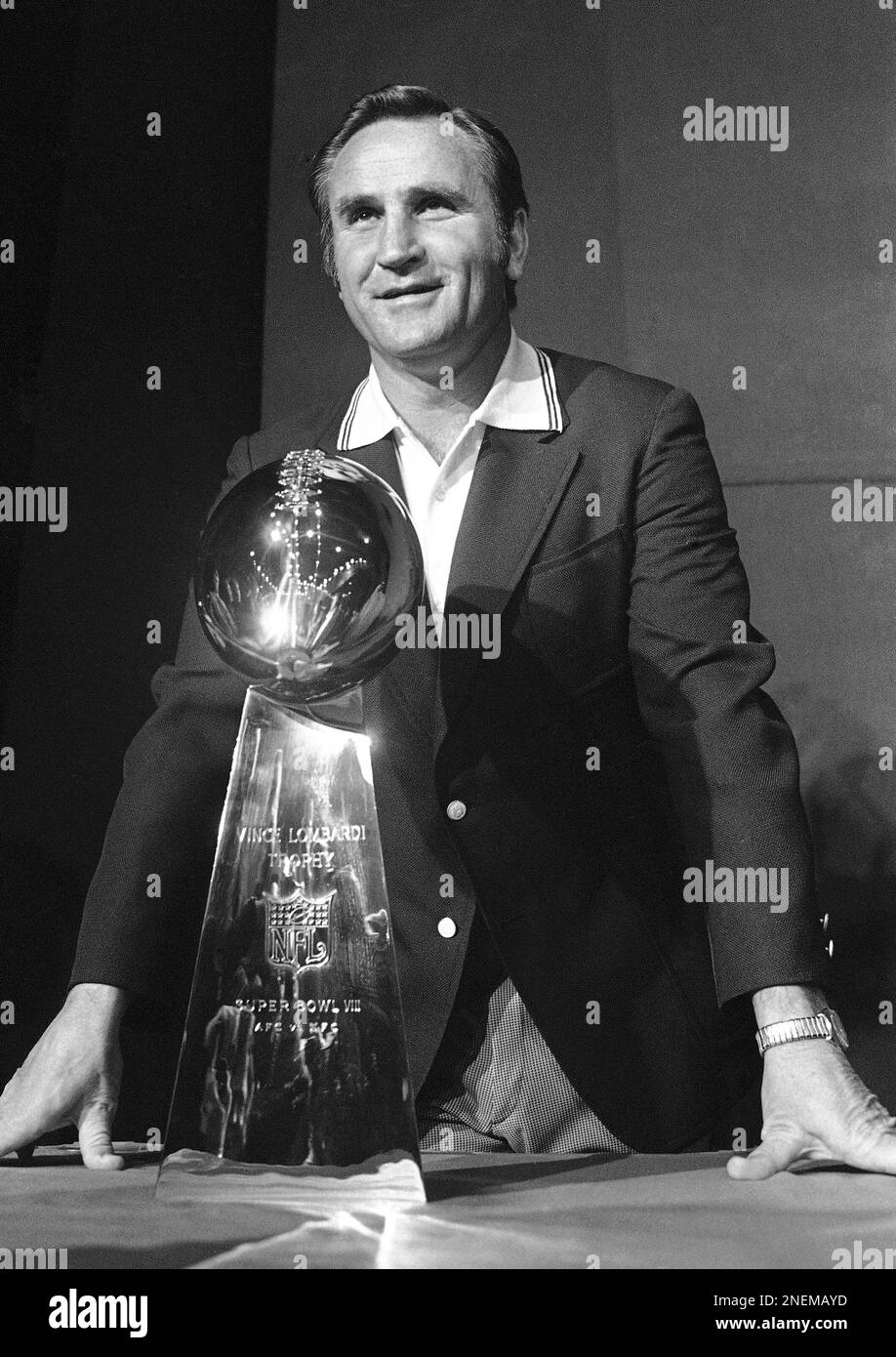 Coach Don Shula of the Miami Dolphins, posed with the Super Bowl trophy ...