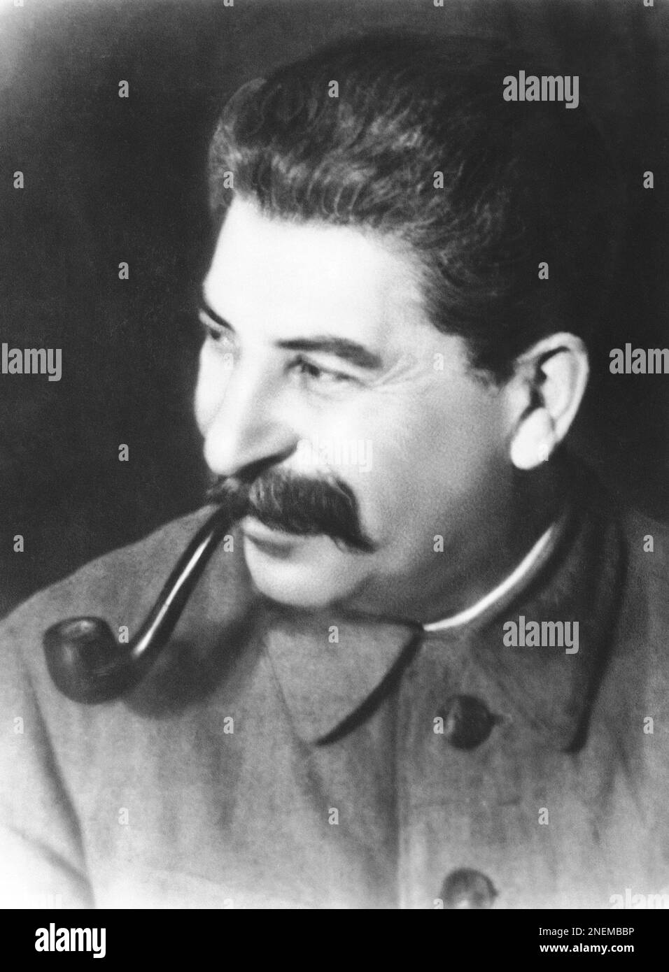 Josef Stalin, the Russian dictator, with pipe, smiling.New official ...