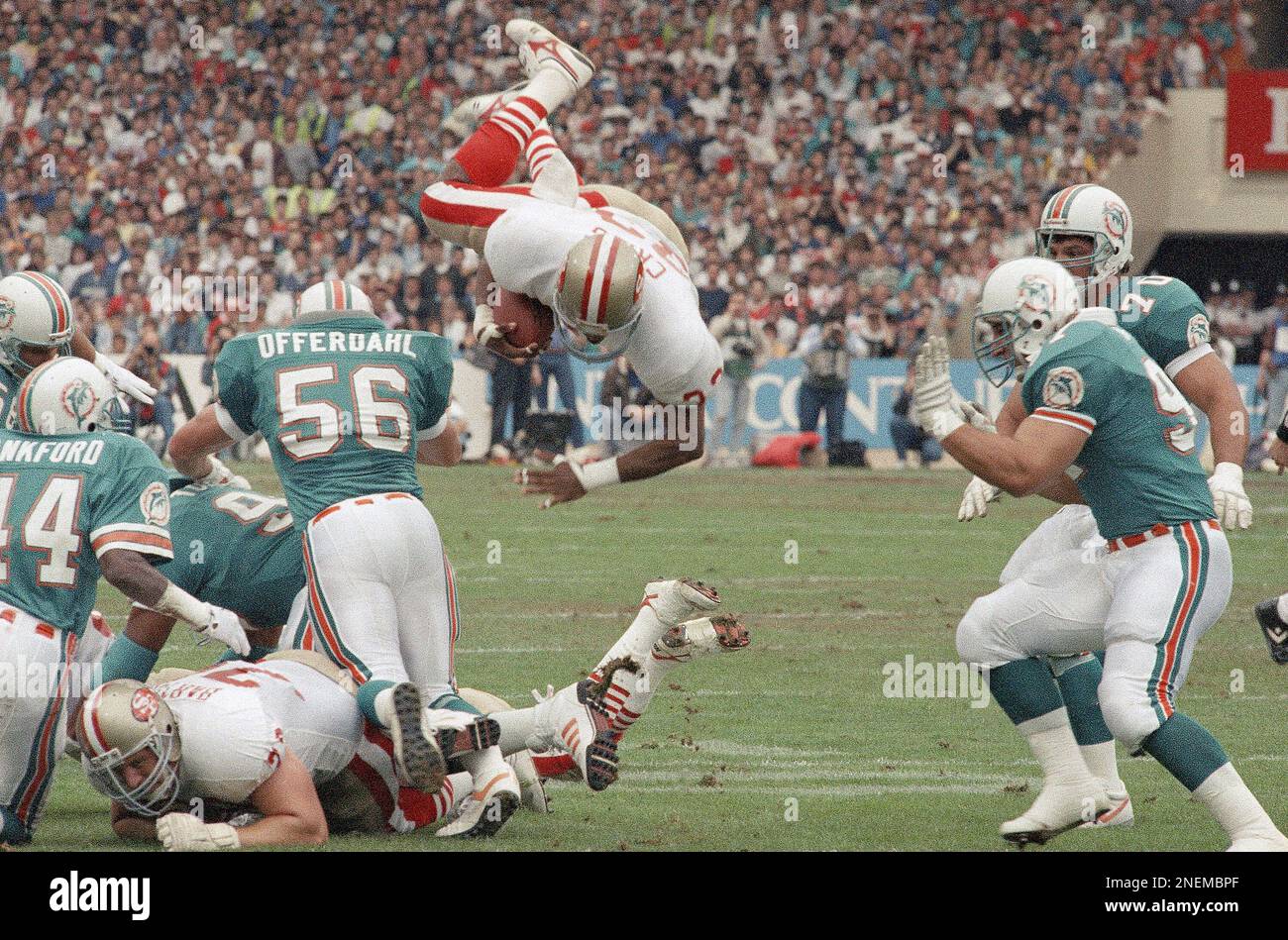 San Francisco 49ers running back Roger Craig holds onto the ball as he ...