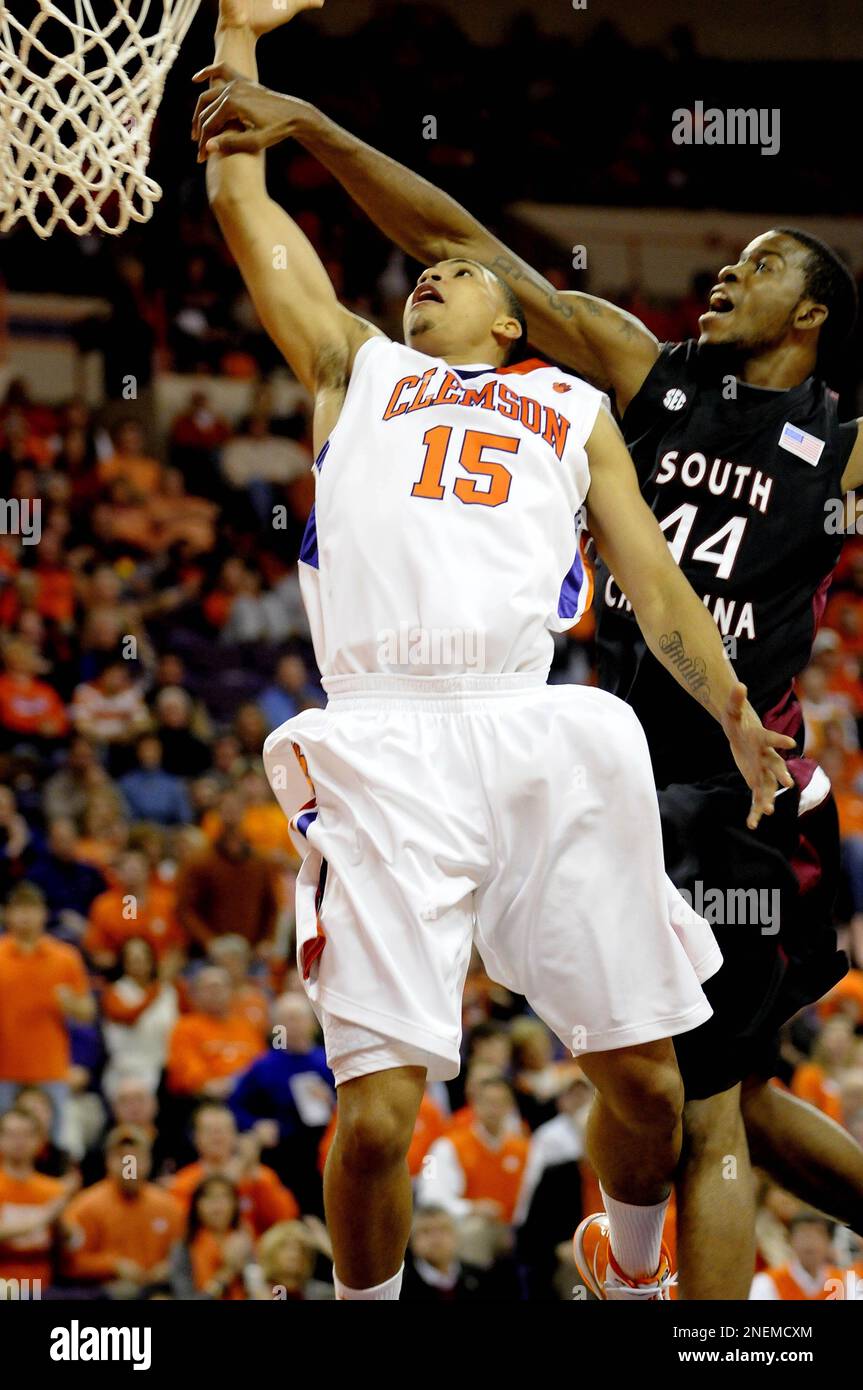 Clemson's David Potter (15) is fouled by South Carolina's Sam Muldrow ...