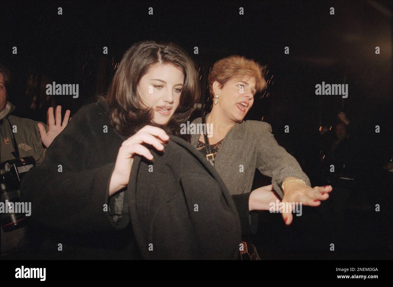 Monica Lewinsky and her stepmother, Barbara Lewinsky push through a ...